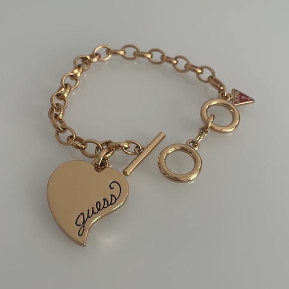 Guess | Jewelry | Guess Gold Plated Charm Bracelet | Poshmark